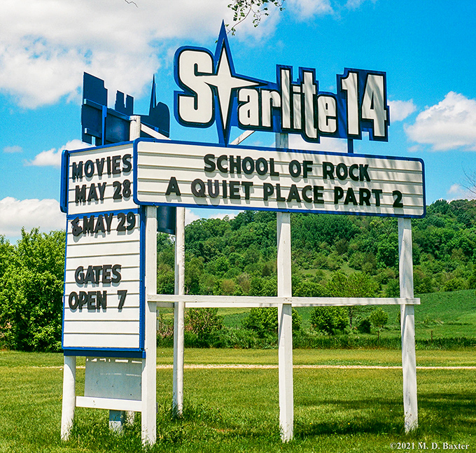 "School of Rock" meets rural charm! Starlite 14's classic marquee stands sentinel against Wisconsin's rolling hills, promising cinematic escapes.