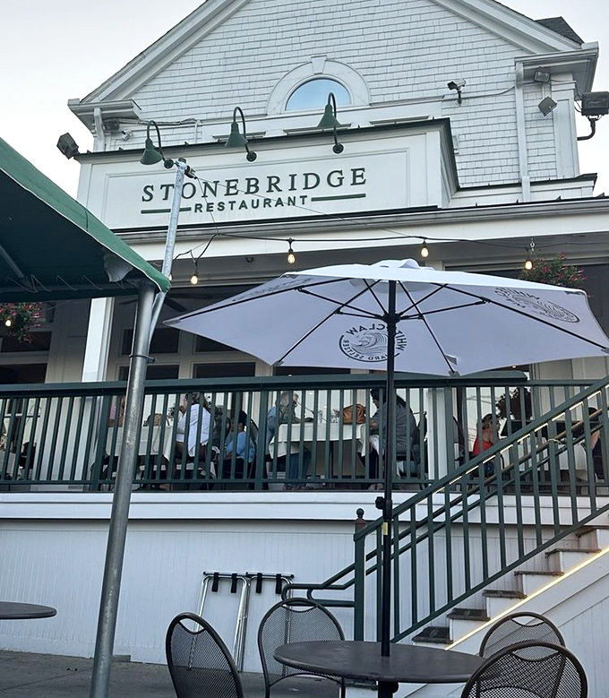 Stonebridge Restaurant's classic white exterior exudes New England charm. That covered porch practically begs you to sit and stay awhile.