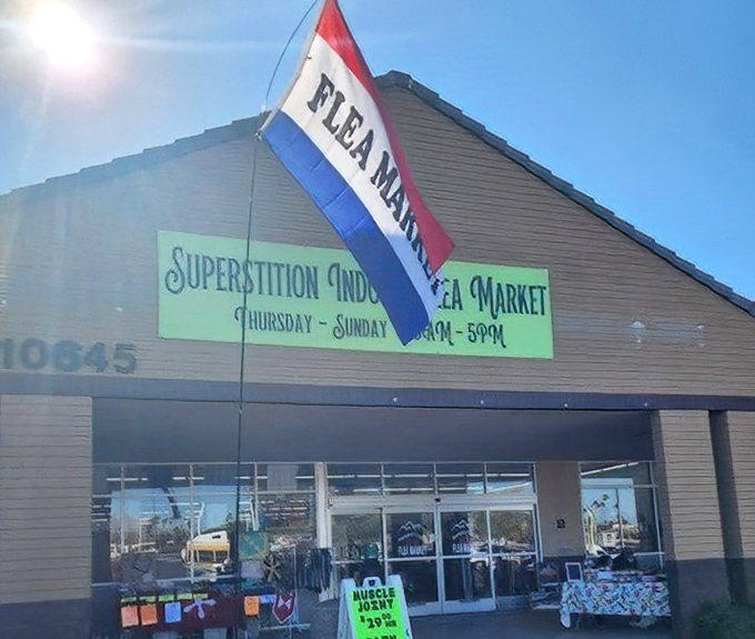 Superstition Indoor Flea Market announces itself with patriotic flair, a beacon for bargain hunters in Apache Junction.