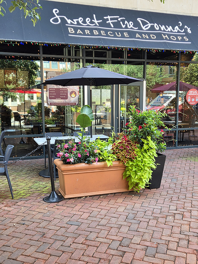 Brick patios and colorful planters create the perfect stage for barbecue that deserves a standing ovation.