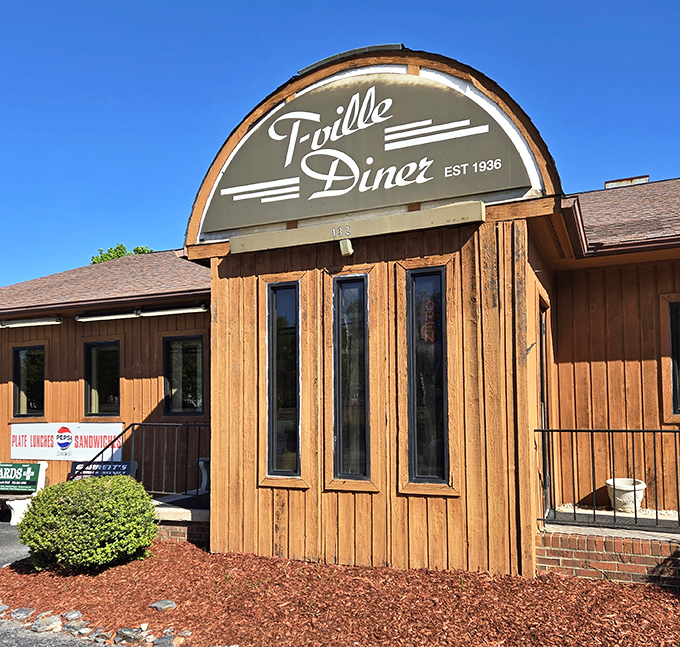 T-Ville Diner's curved sign has been guiding hungry travelers since 1936. Some landmarks feed your soul; this one feeds everything else!