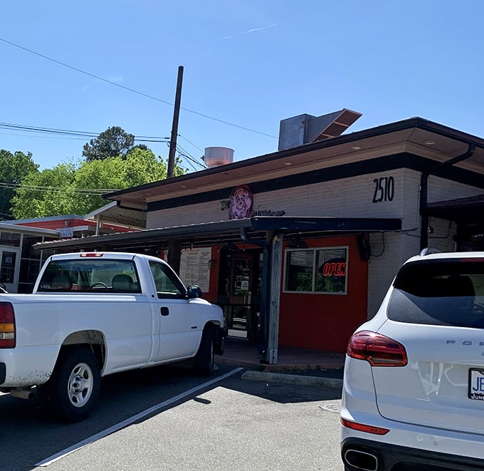 The Original Q Shack's pink exterior is as bold as its flavors &ndash; this Durham institution doesn't hide its personality.