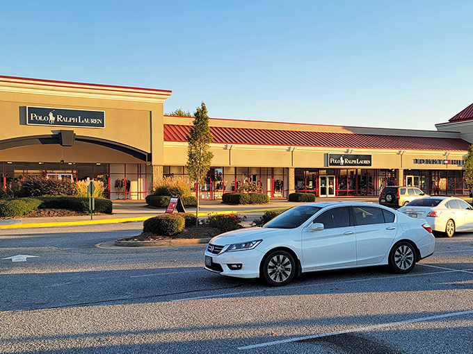 Polo Ralph Lauren's storefront basks in golden hour light, tempting passersby with luxe looks at less-than-luxe prices.