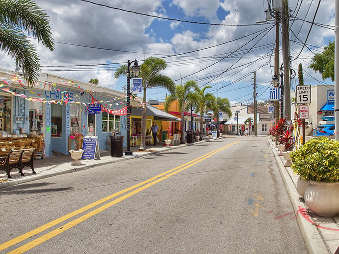 Palm trees stand tall along this sun-drenched street where Greek culture thrives in unexpected Florida splendor.