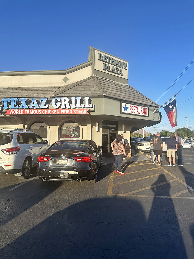 Texaz Grill's unassuming corner location hides a temple to chicken-fried steak. That Texas flag isn't just decoration&mdash;it's a flavor promise.