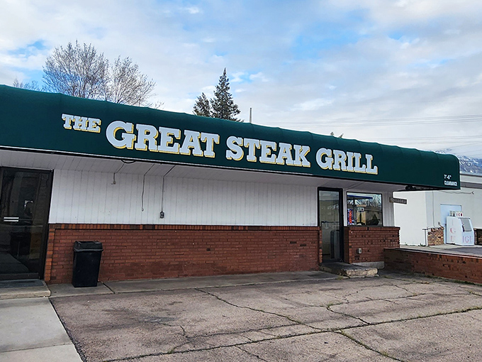 Simple green signage announces big steak dreams in this unassuming Provo neighborhood gem.