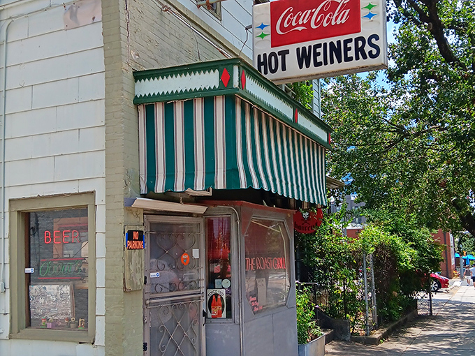 The Roast Grill's striped awning beckons like a lighthouse for downtown Raleigh's hungry masses below.