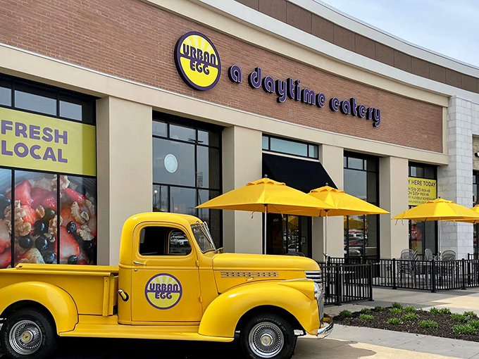 That vintage yellow truck isn't going anywhere - it's found its perfect parking spot outside breakfast heaven.