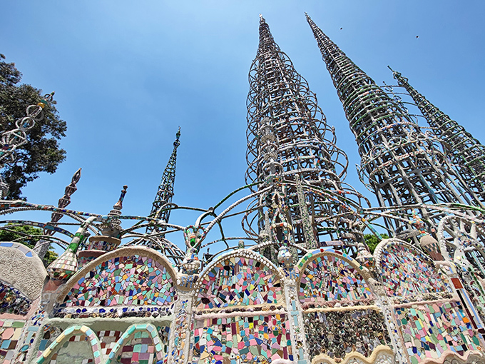 Intricate mosaic work covers every surface of the Watts Towers, creating a shimmering monument to creativity.