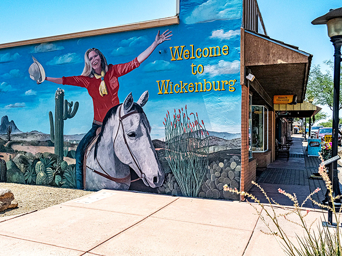 Wickenburg welcomes visitors with this charming mural featuring a cowgirl on horseback. The town's dude ranch heritage rides on!