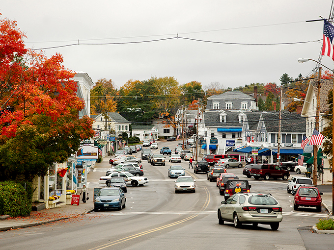 Fall foliage creates a natural fireworks display along these tree-lined streets, proving nature's the ultimate interior decorator.