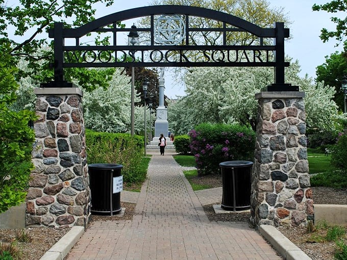 Gateway to affordable bliss! Woodstock Square's stone-pillared entrance invites you into a world where your Social Security check stretches like saltwater taffy.