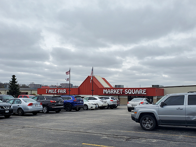 The famous red barn beckons shoppers like a lighthouse guides ships to their treasure-filled destination.