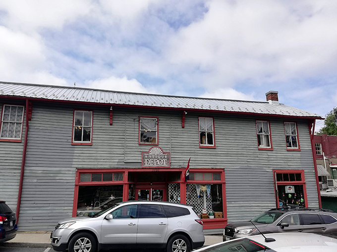 With its historic facade and bright red trim, Antique Depot looks like it belongs in a collection of vintage buildings itself.