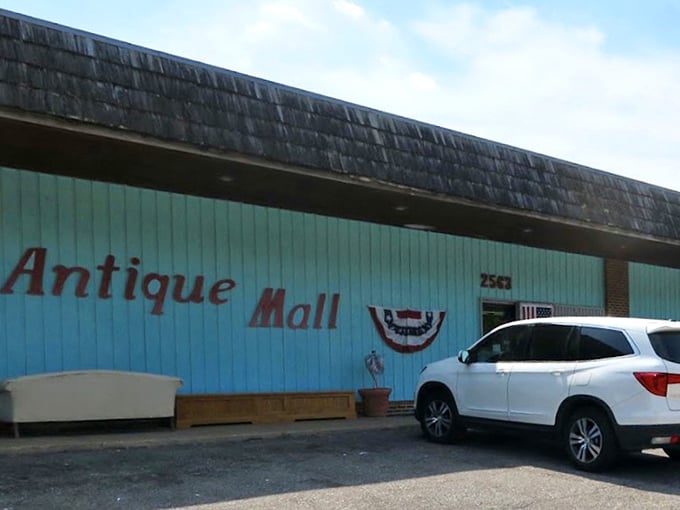 "Antique Mall" painted bold and proud - sometimes the best treasures hide behind the most honest advertising.