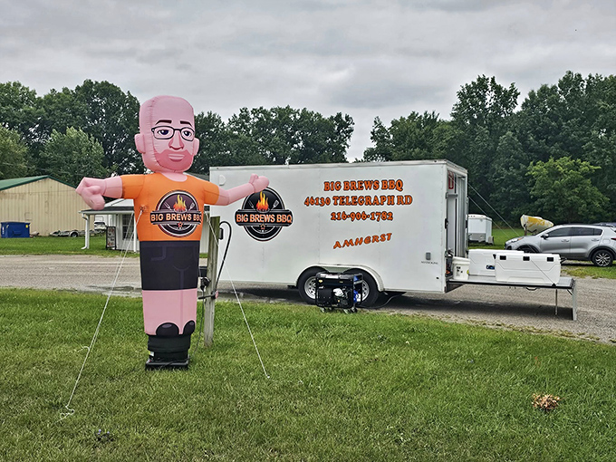The inflatable mascot outside Big Brews BBQ food truck brings a smile before the first bite. Serious BBQ with a side of fun!