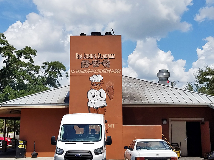 The chef logo tells the whole story - serious barbecue craftsmanship happens behind these simple walls.