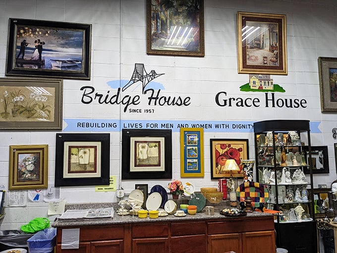 Bridge House's art collection transforms white walls into a gallery experience, proving beautiful decor doesn't require a beautiful budget.