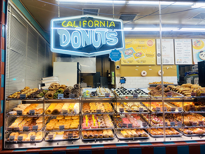 Donut paradise awaits inside. That display case is like the Louvre of fried dough masterpieces.