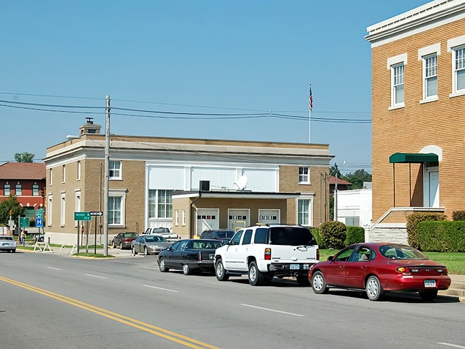 Mature trees shade the sidewalks here, providing natural air conditioning during those sweltering Kansas summer afternoons.