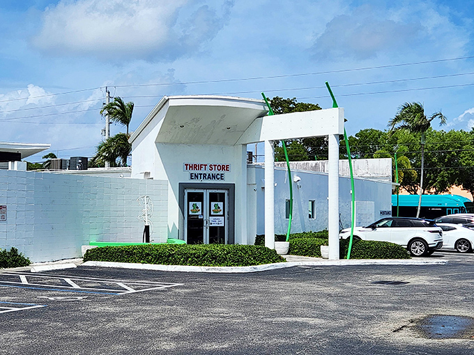 Florida sunshine highlights Charity Thrift's welcoming entrance. Those green shrubs frame a doorway to discount paradise.