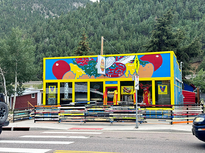 That rainbow fence made from old ski boards perfectly captures Idaho Springs' blend of mountain culture and creative food spirit.