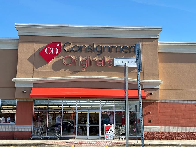 Clean storefronts and professional displays hint at the carefully curated designer treasures waiting inside this sophisticated consignment destination.