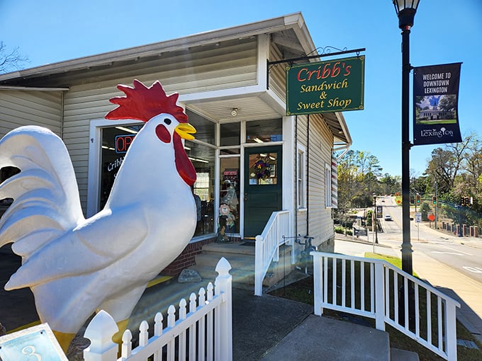 Cribb's giant rooster mascot stands guard, ensuring only the worthy experience their legendary sandwiches.