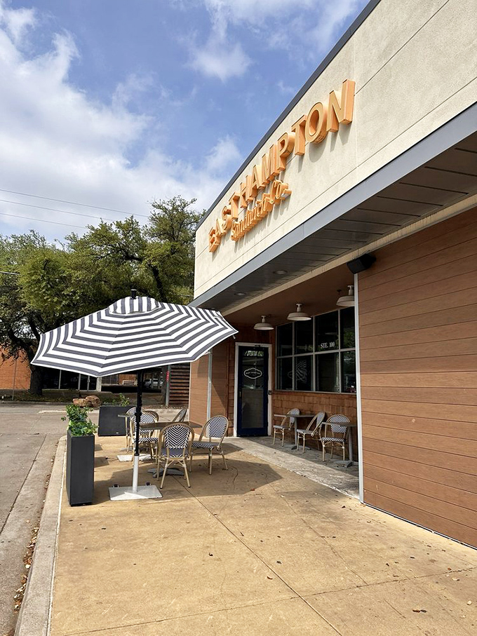 Clean lines and striped umbrellas create the perfect backdrop for seriously elevated sandwich experiences.