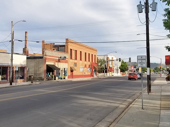 Historic storefronts line streets where shopping feels more like visiting old friends than running errands.