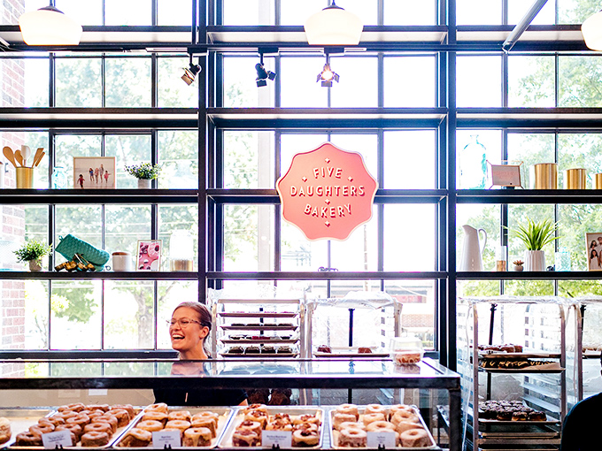 Look at those trays of fresh donuts lined up like soldiers of joy, ready to make your day better.