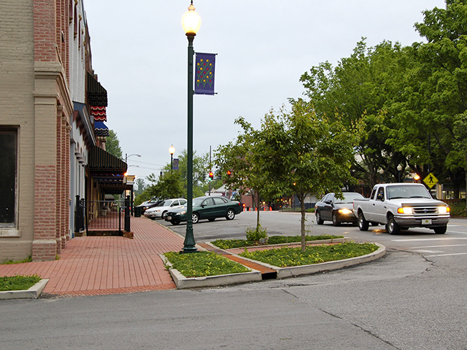 Wide streets and generous sidewalk reflect a town that still values convenience over costly urban density.