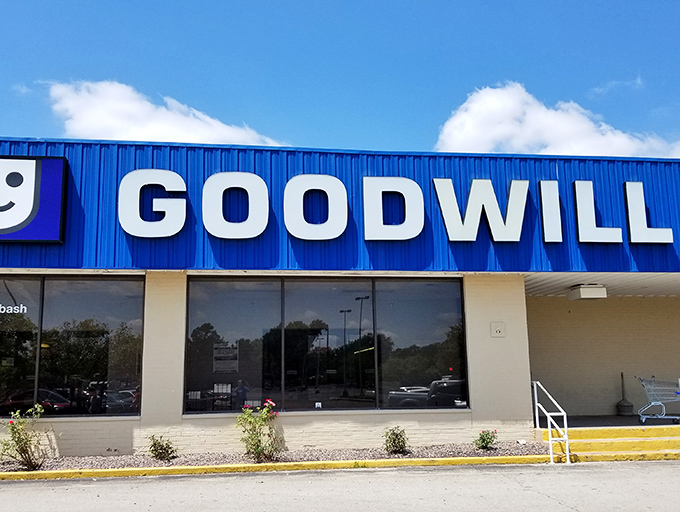 The bright blue exterior signals serious bargain hunting opportunities await inside this well-organized store.