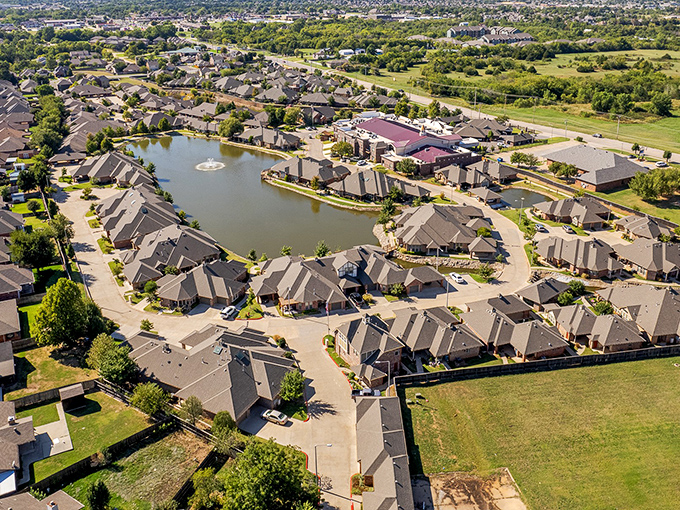 Aerial perspective reveals how water features transform ordinary retirement living into something truly special.