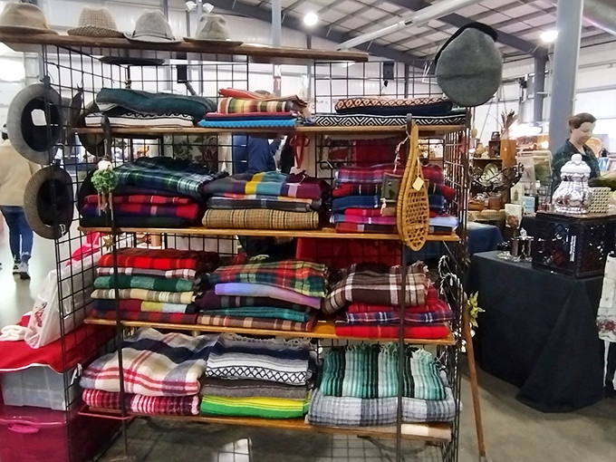 Colorful blankets and vintage treasures stack neatly on display&mdash;each item whispering stories from another era, waiting for new listeners.