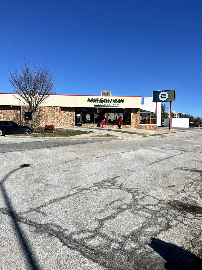 The spacious parking lot outside HomeSweetHome Cafe hints at its popularity among locals seeking comfort food.