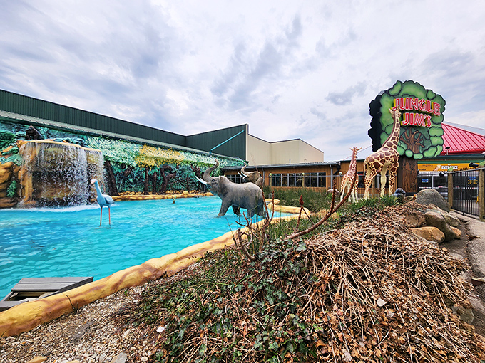 Jungle Jim's outdoor area features a vibrant waterfall and animal sculptures, proving that even the exterior of this wild supermarket refuses to be ordinary.