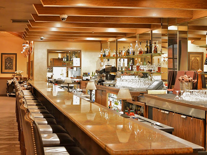 That gleaming bar stretches like a promise of perfectly paired wines and expertly grilled steaks ahead.