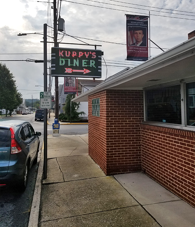 That vintage neon sign still glows with the promise of perfectly cooked eggs and endless coffee.