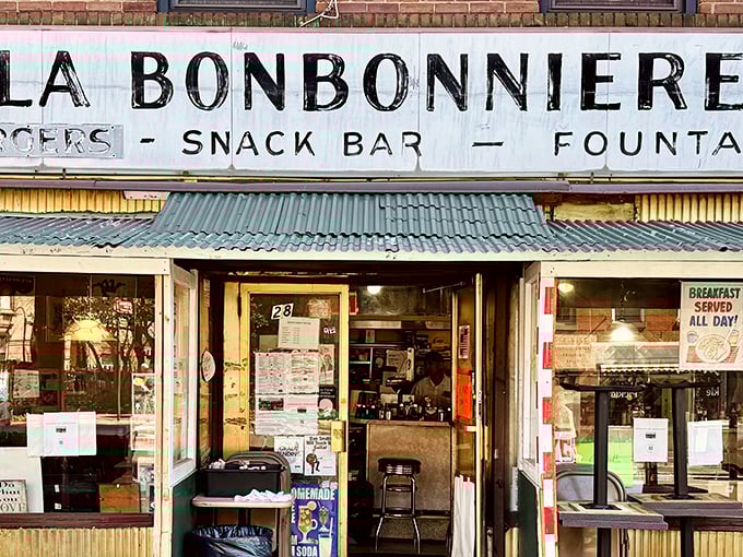 Vintage signs and narrow spaces create the intimate breakfast experience that chain restaurants simply cannot replicate.