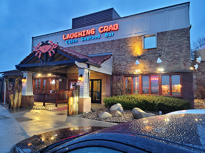 Even after dark, the Laughing Crab's warm glow beckons seafood lovers like a lighthouse for hungry sailors.