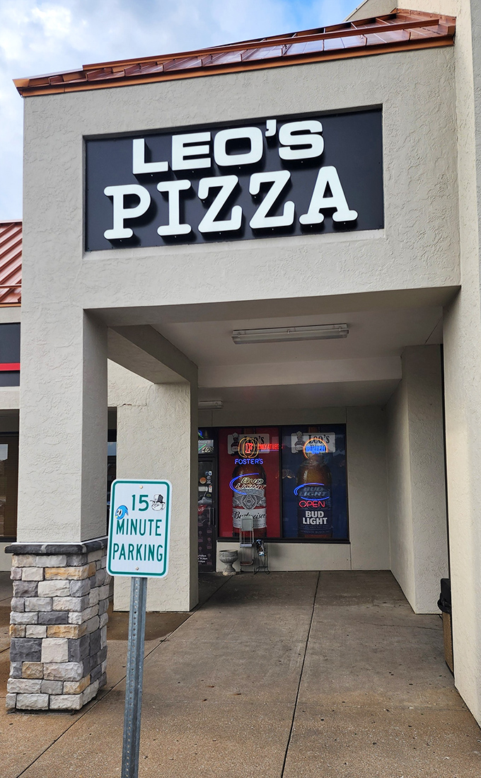 That welcoming entrance promises the kind of pizza that turns strangers into regulars after just one bite.