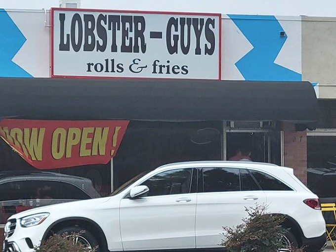 That cheerful storefront practically shouts "fresh lobster inside" - and thankfully, it delivers on every colorful promise made.