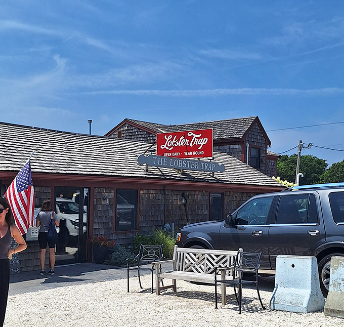The weathered exterior tells stories of countless storms, while inside, fresh seafood creates new happy memories daily.