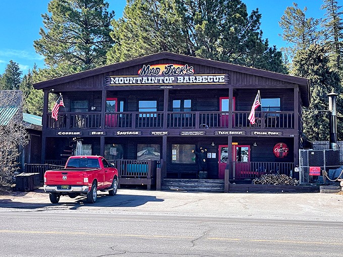 The menu items listed right on Mad Jack's facade are like a smoky treasure map. Follow it to brisket gold!