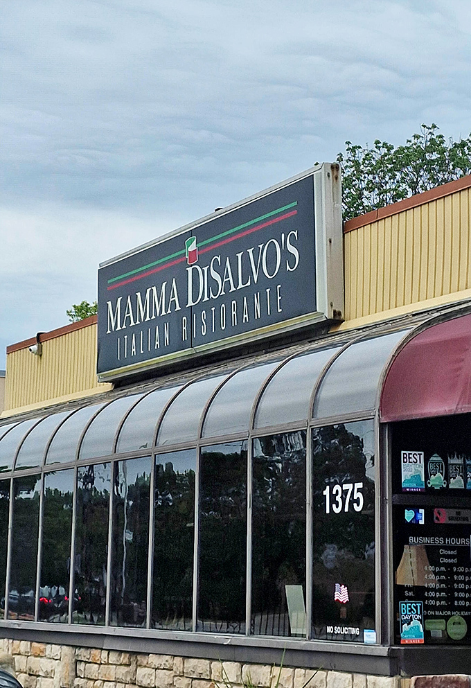 That classic sign with Italian flag colors is like a bat signal for those craving authentic homemade pasta.