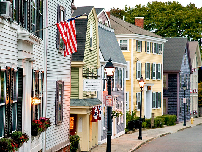 Church steeples rise above colorful homes on hillside streets so picturesque they make you understand why postcards were invented.