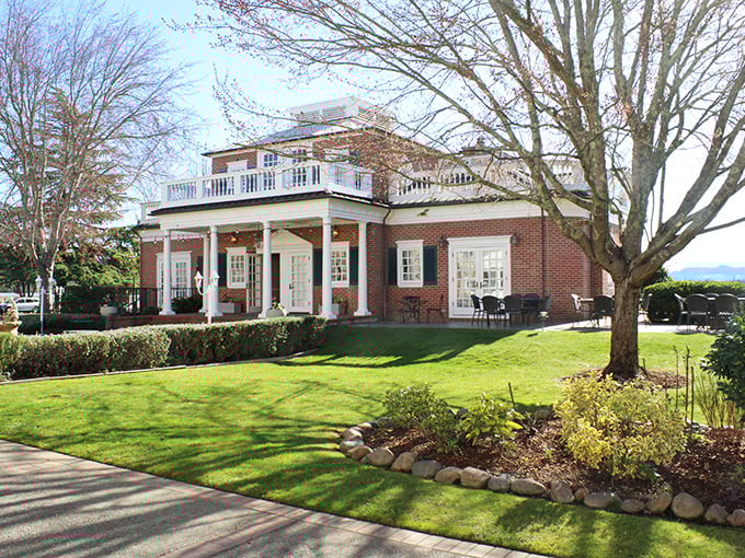 Perfectly manicured gardens frame this elegant tasting room. Wine with a side of American history!