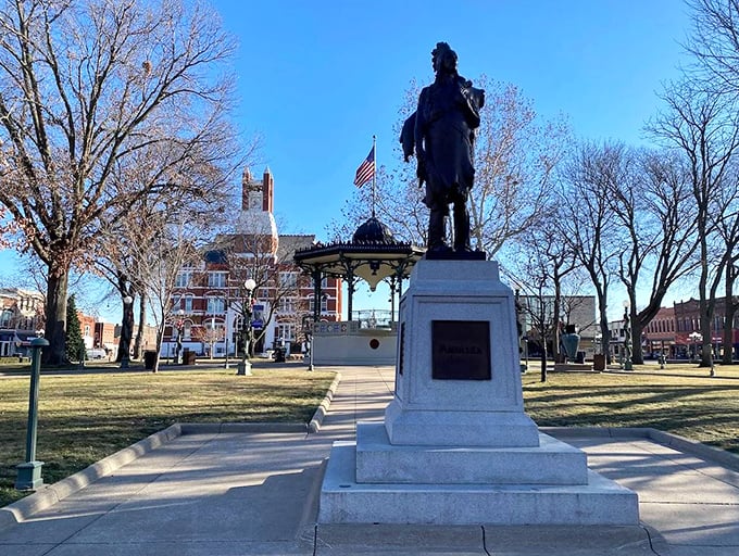 The statue standing guard in Oskaloosa's town square has witnessed generations of affordable living and neighborly kindness.