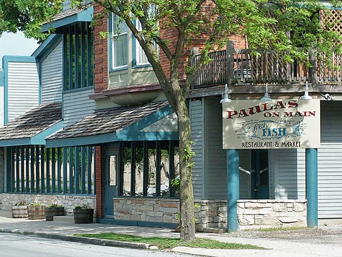 That charming blue trim and brick exterior hide a seafood market and restaurant combo that locals have treasured for years.